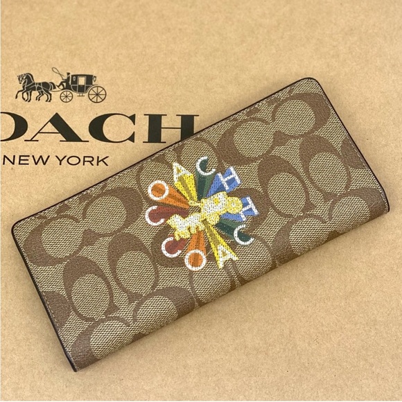 Coach | Bags | Coach Slim Wallet In Signature Canvas With Coach Radial ...